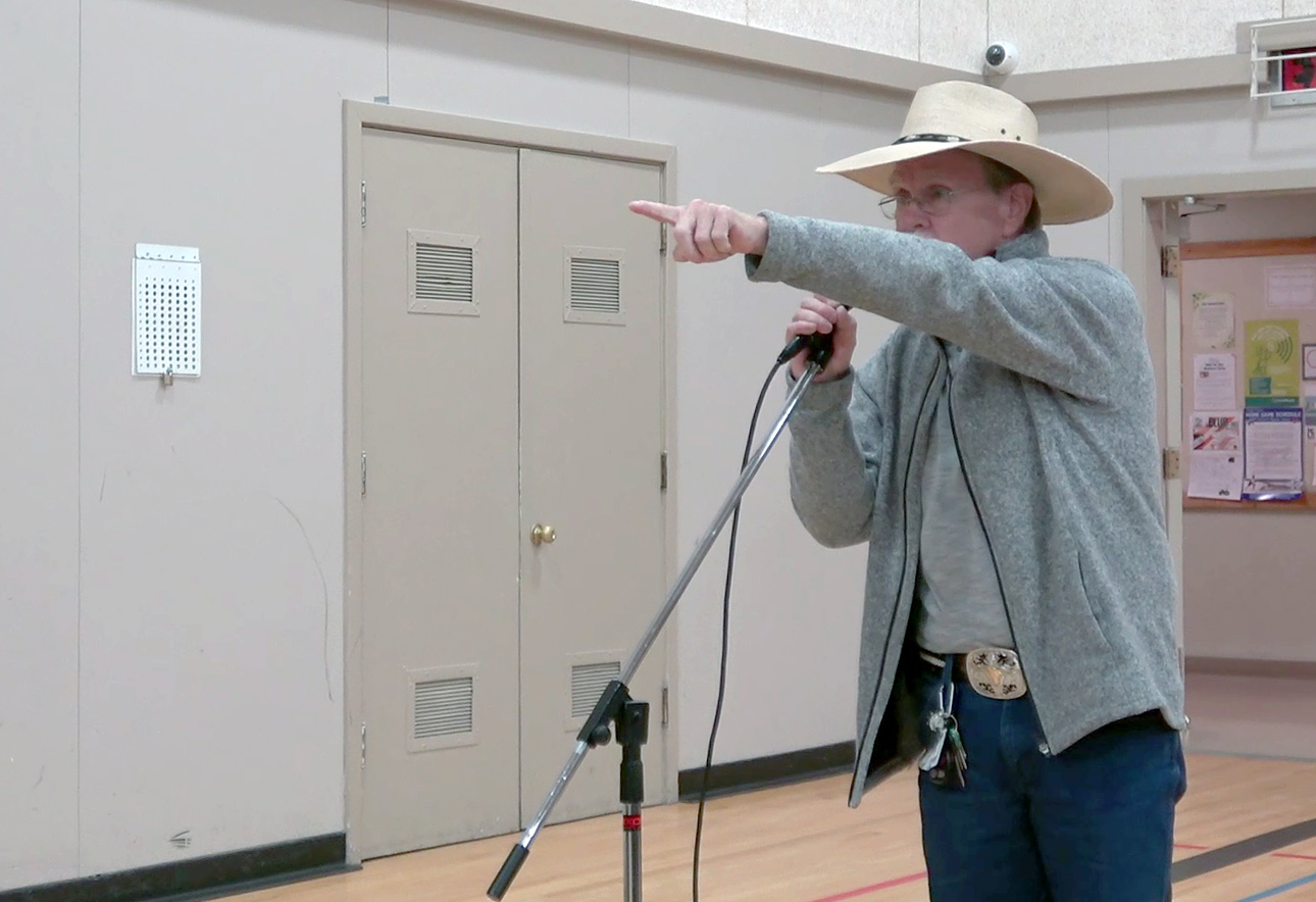 Resident who sleeps with baseball bat asks candidates about policing at ...