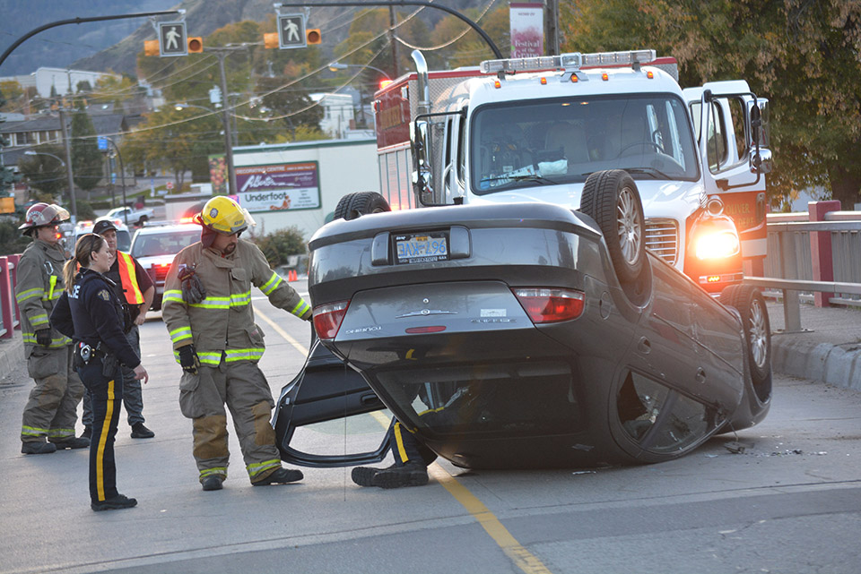 Car overturns on bridge - TimesChronicle.ca