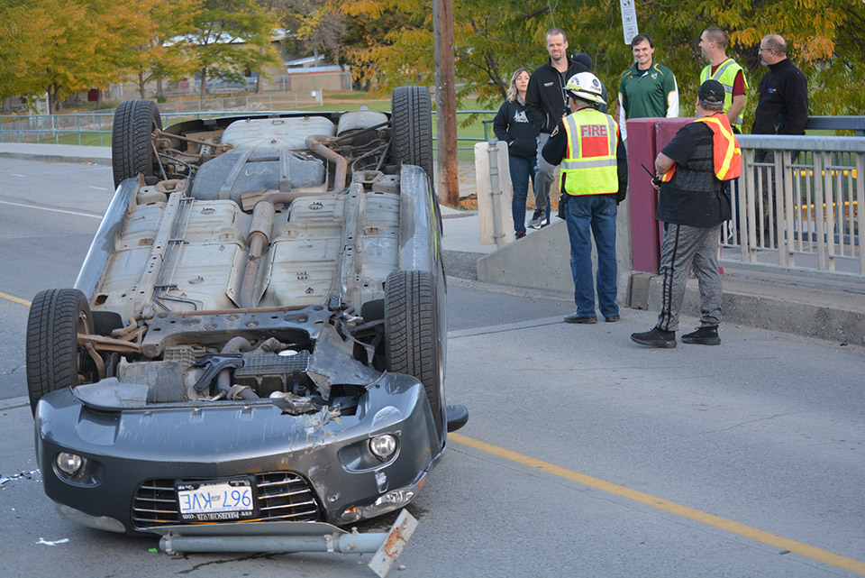 Car overturns on bridge - TimesChronicle.ca