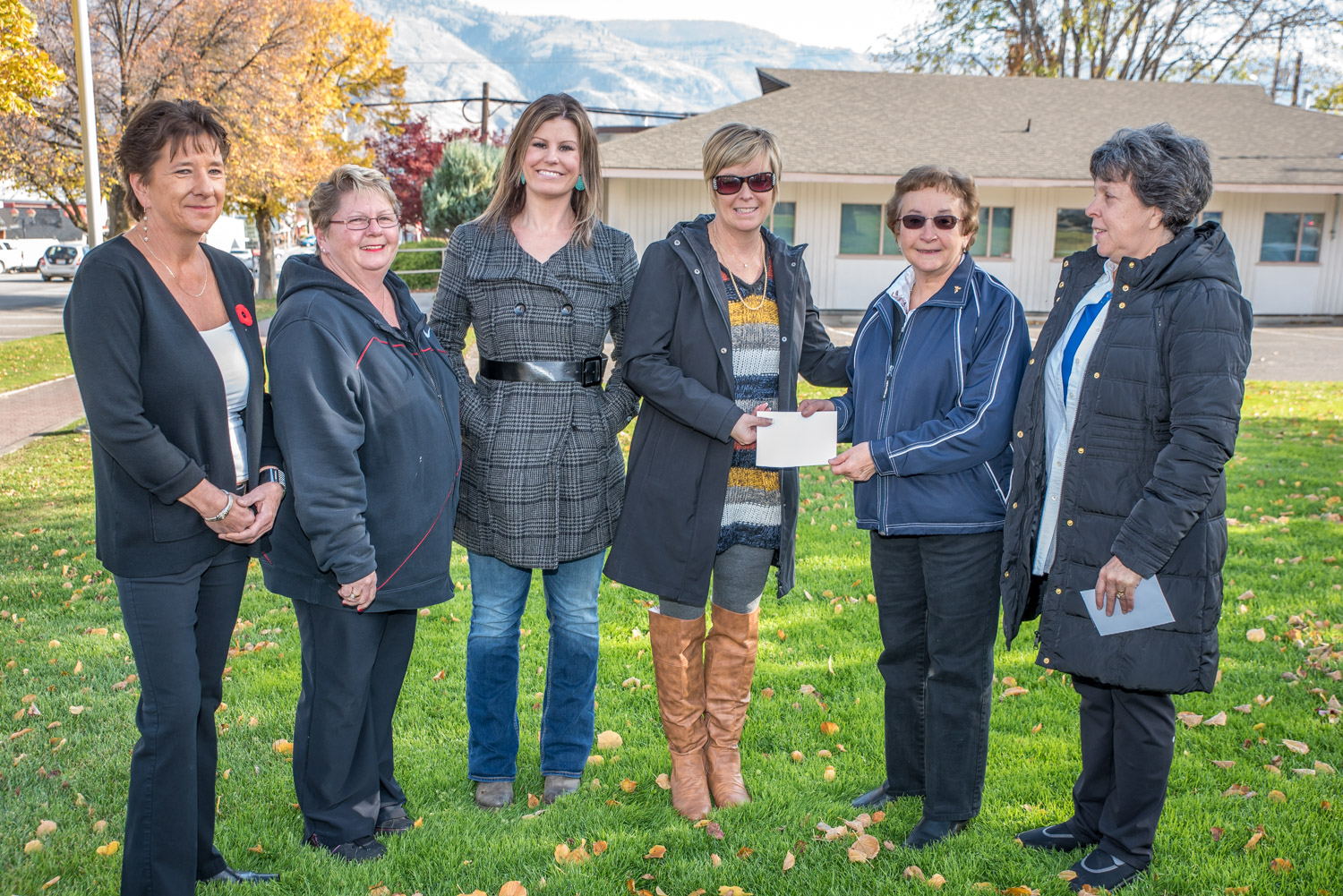 Community turns over $31,000 to help Rock Creek fire victims ...