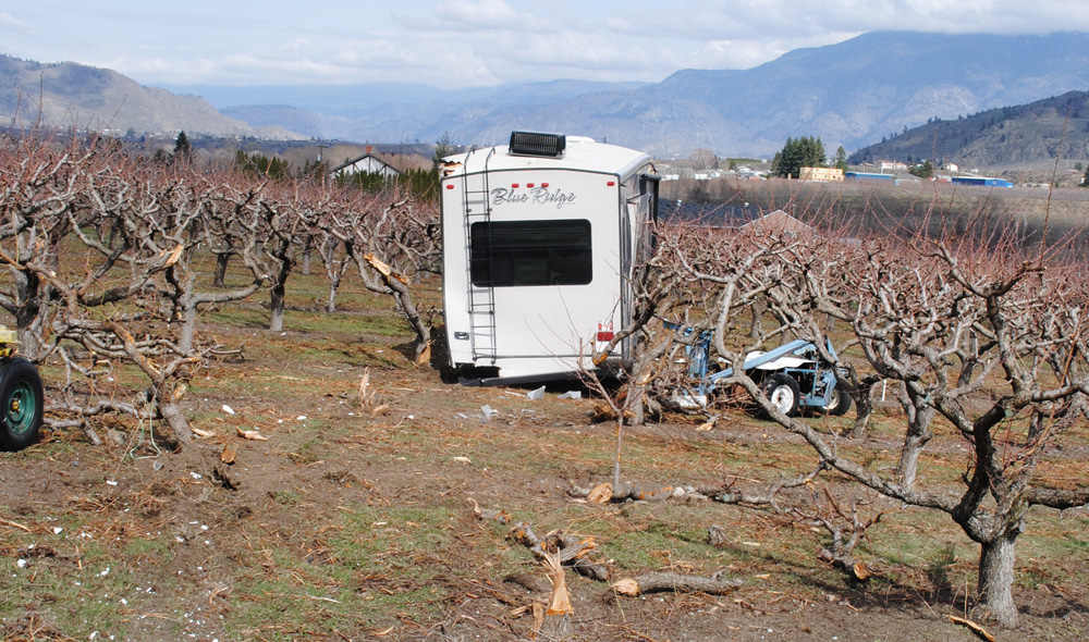 Fifth wheel crashes through orchard - TimesChronicle.ca