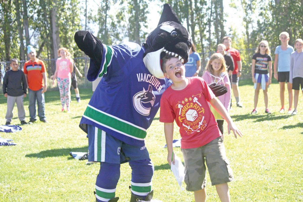 Canucks mascot Fin comes bearing gifts during visit to Osoyoos ...