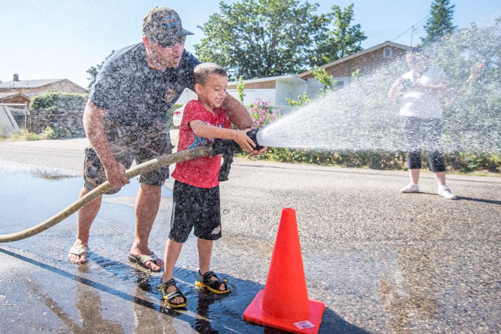 Kindergarten kids from Osoyoos Elementary School are firefighters for a ...