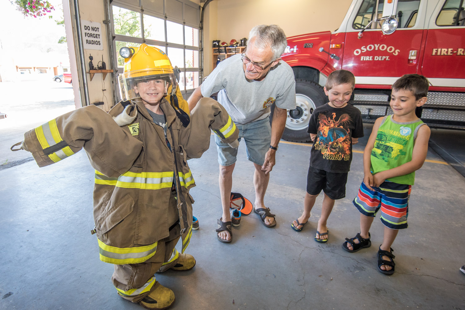Kindergarten kids from Osoyoos Elementary School are firefighters for a ...