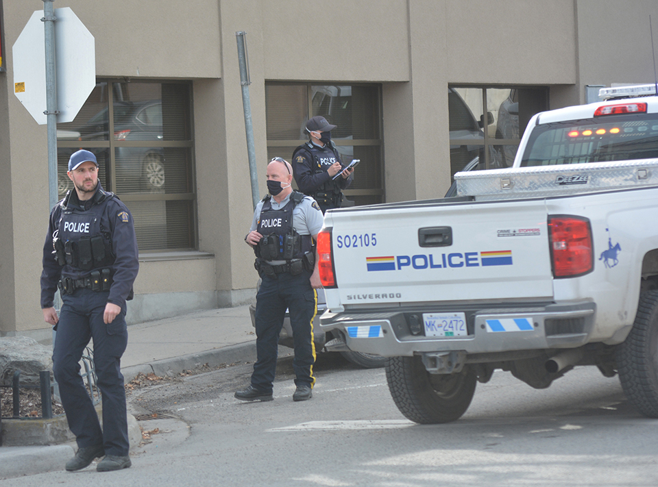 Police arrest two suspects outside bank - TimesChronicle.ca